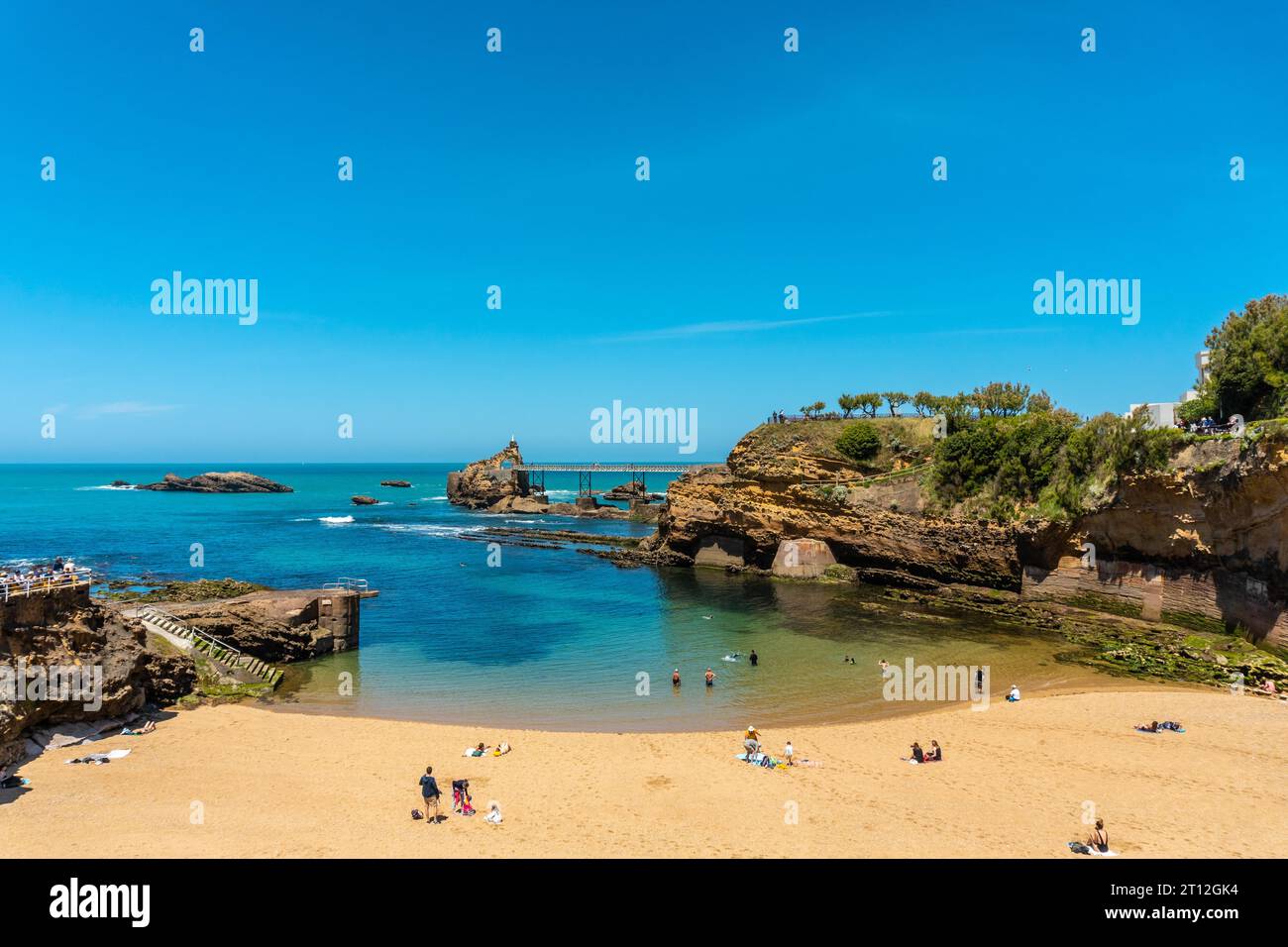 The beautiful Plage du Port Vieux on a summer afternoon where bathers ...