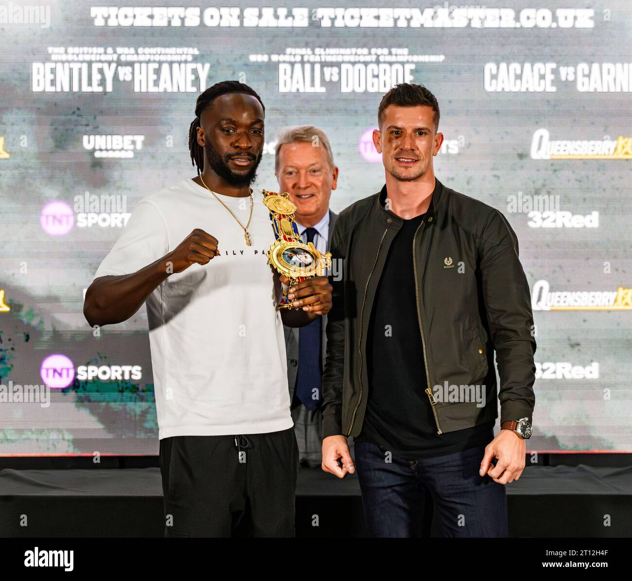 LONDON, UNITED KINGDOM. 10 Oct, 23. Frank Warren (centre) Denzel ...