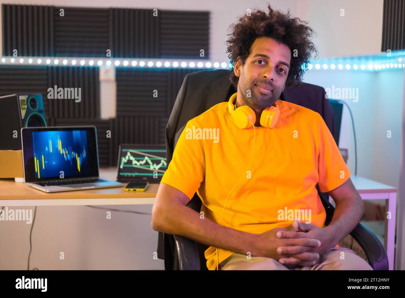 Horizontal and frontal portrait of a financial advisor looking at ...