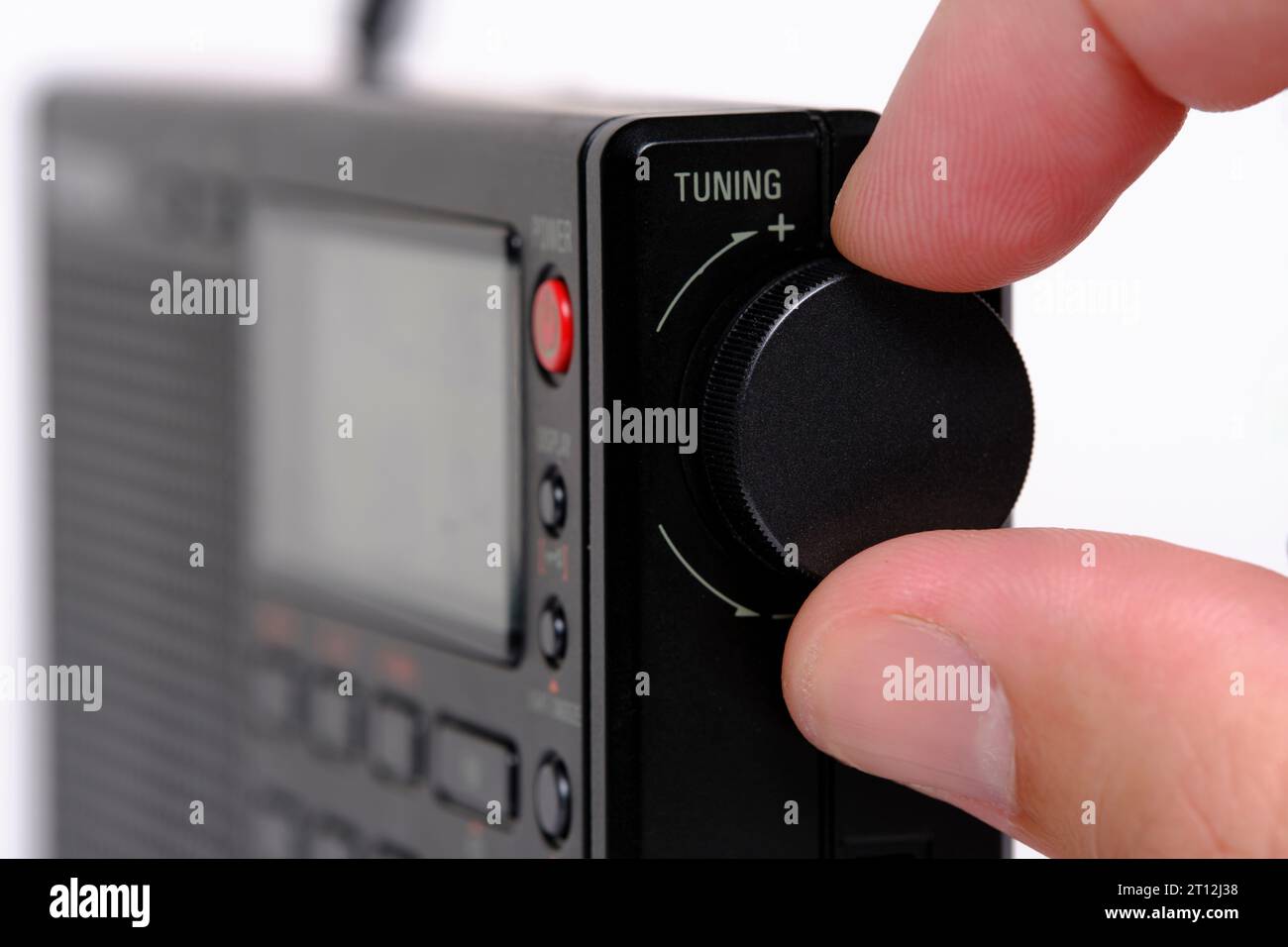 Fingers turn rotary wheel radio waves tuning radio receiver Stock Photo ...