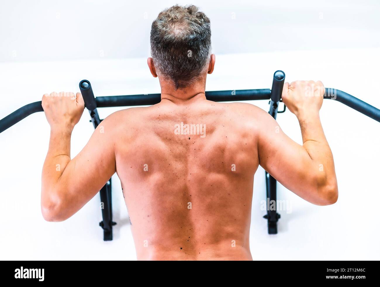Patient doing a pullup. Reopening with security measures of ...