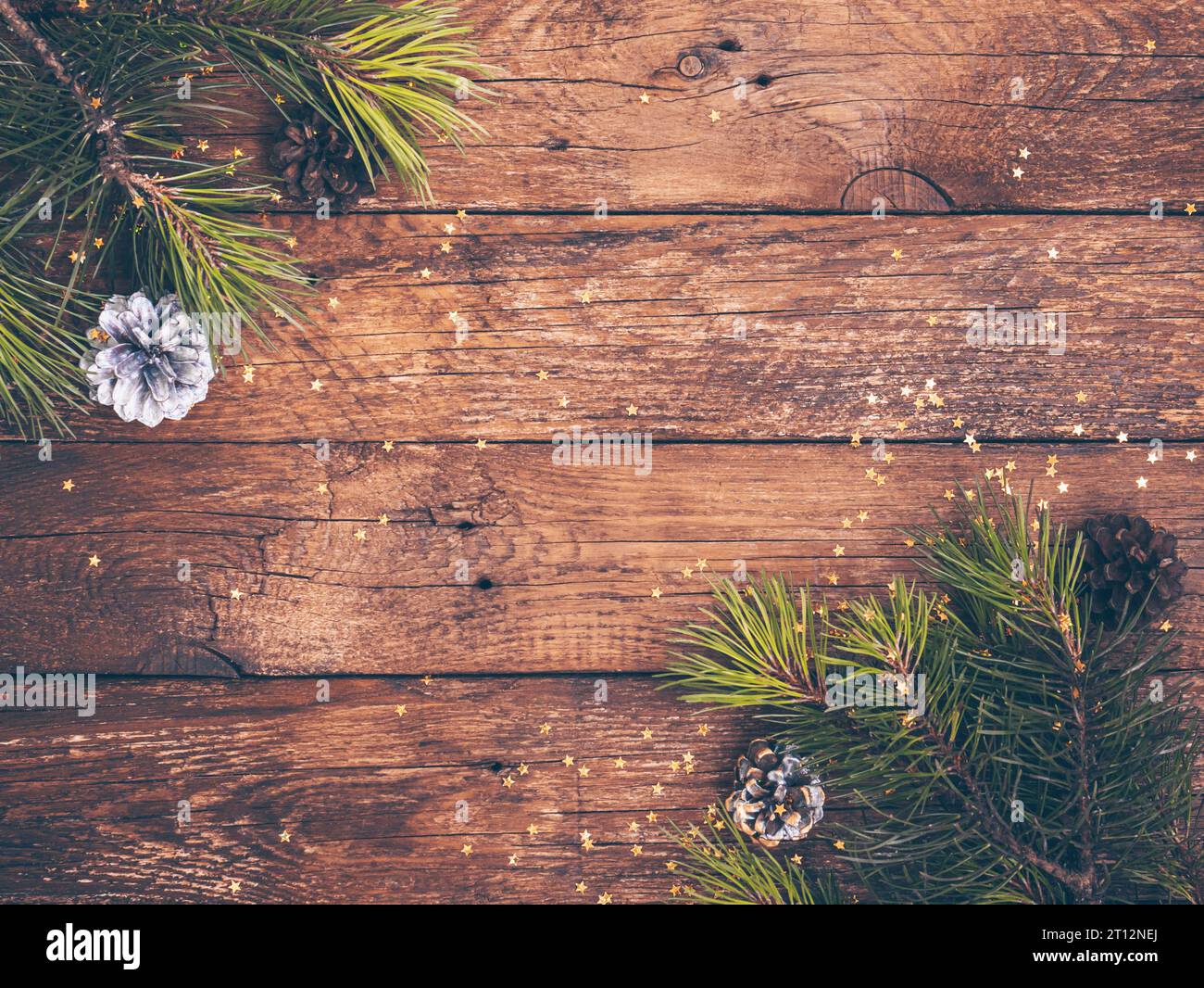Vintage Christmas rustic background. Planked wood with Christmas fir ...