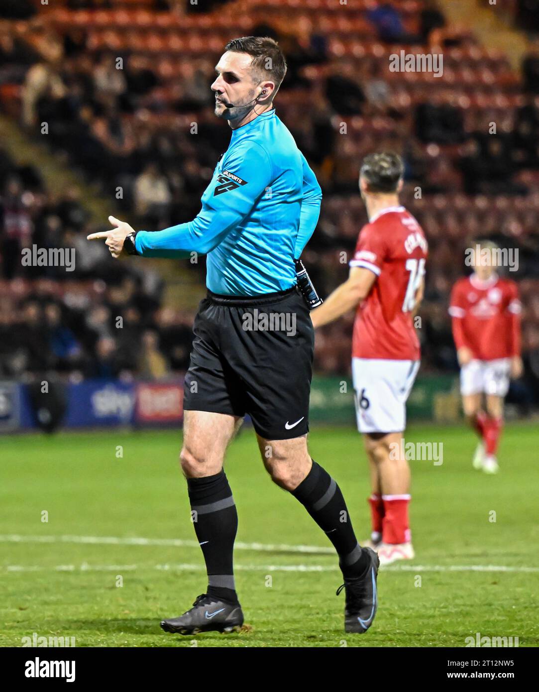 Referee Aaron Jackson awards Wrexham a penalty, during the EFL Trophy ...