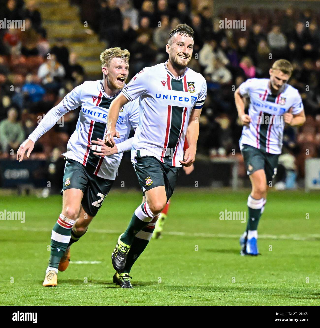 Luke Young 8# of Wrexham Association Football Club celebrates scoring ...