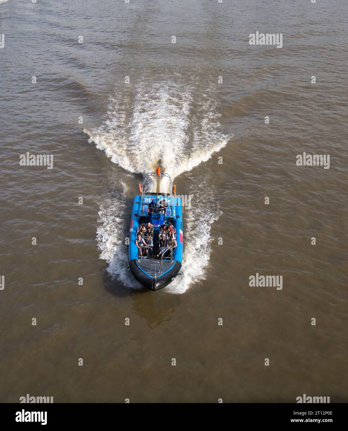Tourist Inflatable Boat Speeds along the River Thames Under Waterloo ...