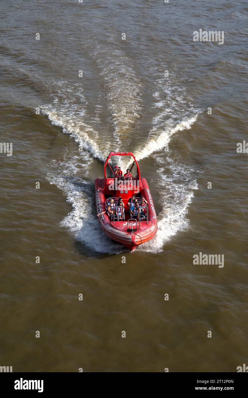Tourist Inflatable Boat Speeds along the River Thames Under Waterloo ...