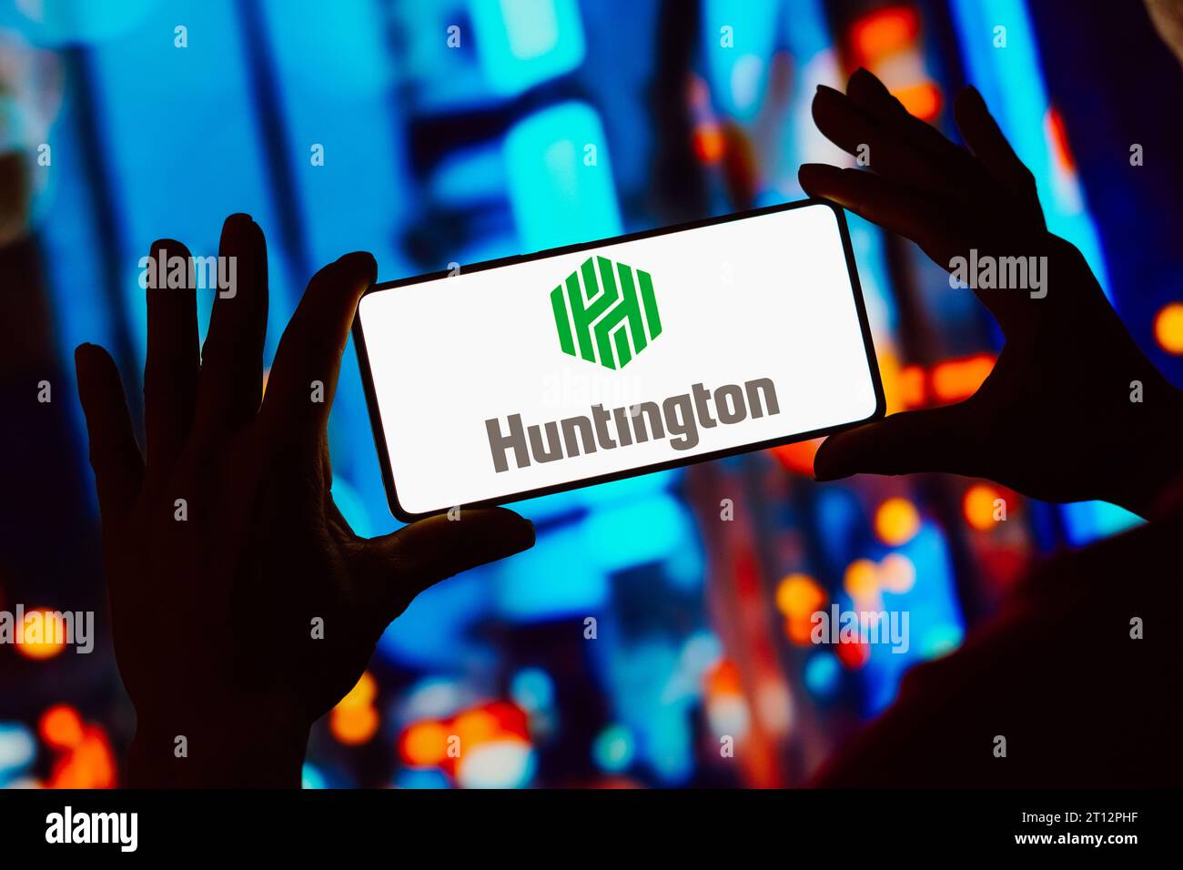 In this photo illustration, the Huntington Bank logo is displayed on a ...