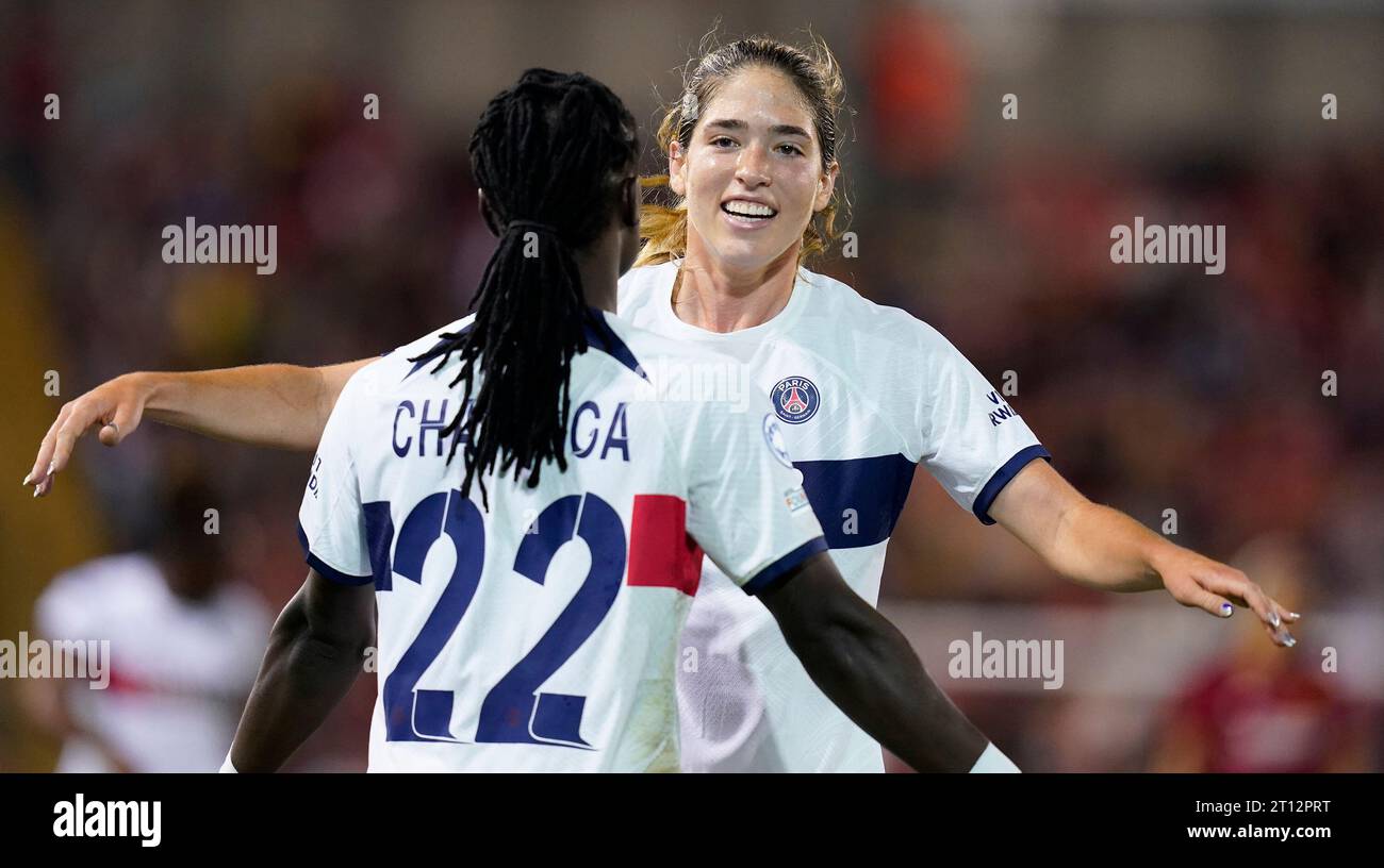 Leigh, UK. 10th Oct, 2023. Tabitha Chawinga of PSG (L) celebrates with ...