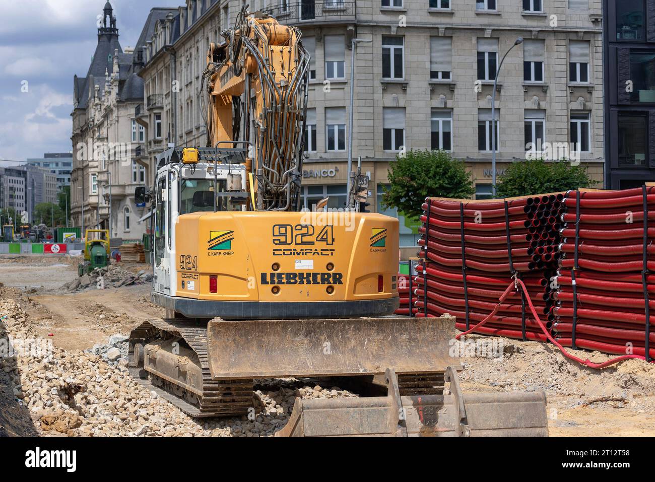 Yellow crawler excavator Liebherr R 924 Compact on construction site ...