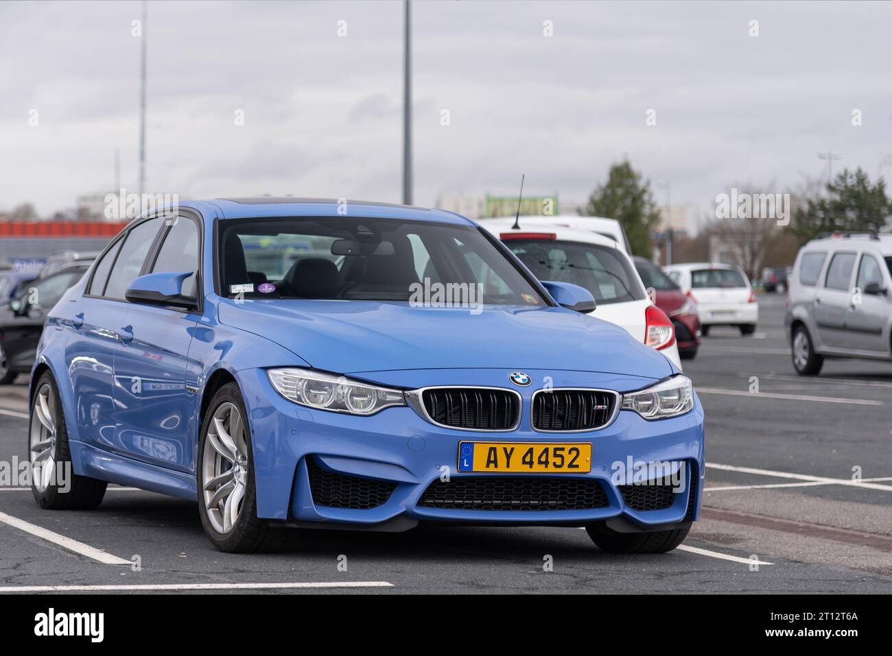 Blue BMW M3 F80 parked in a parking Stock Photo - Alamy