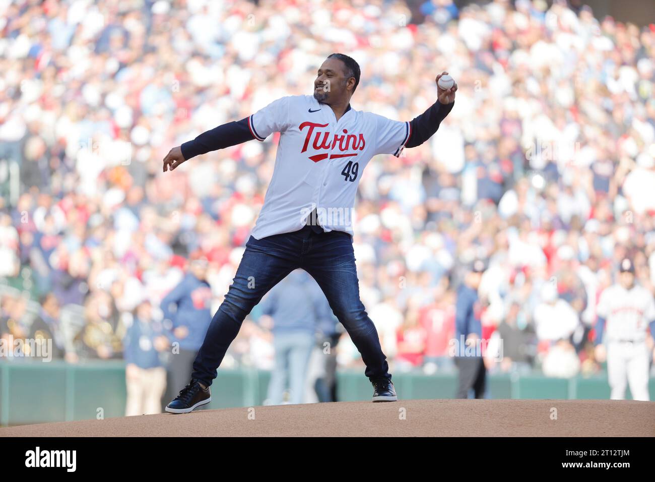 Former Minnesota Twins pitcher Johan Santana wears a Pablo Lopez jersey ...