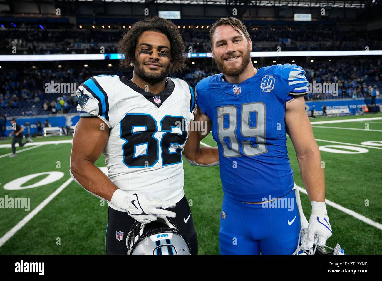 Carolina Panthers tight end Tommy Tremble (82) and Detroit Lions tight ...