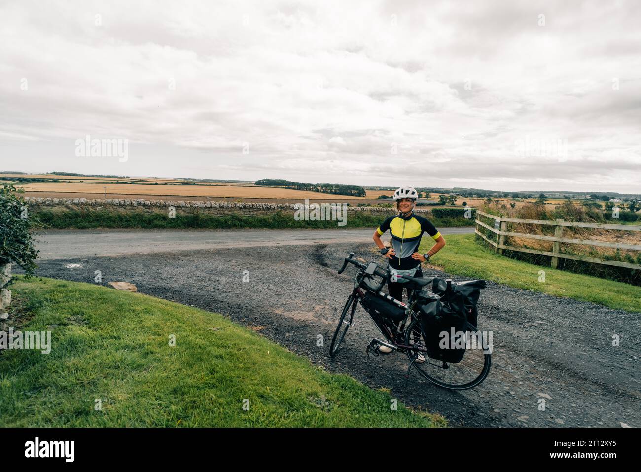 Traveller on bicycle. Solo travel long distance bicycle touring concept ...