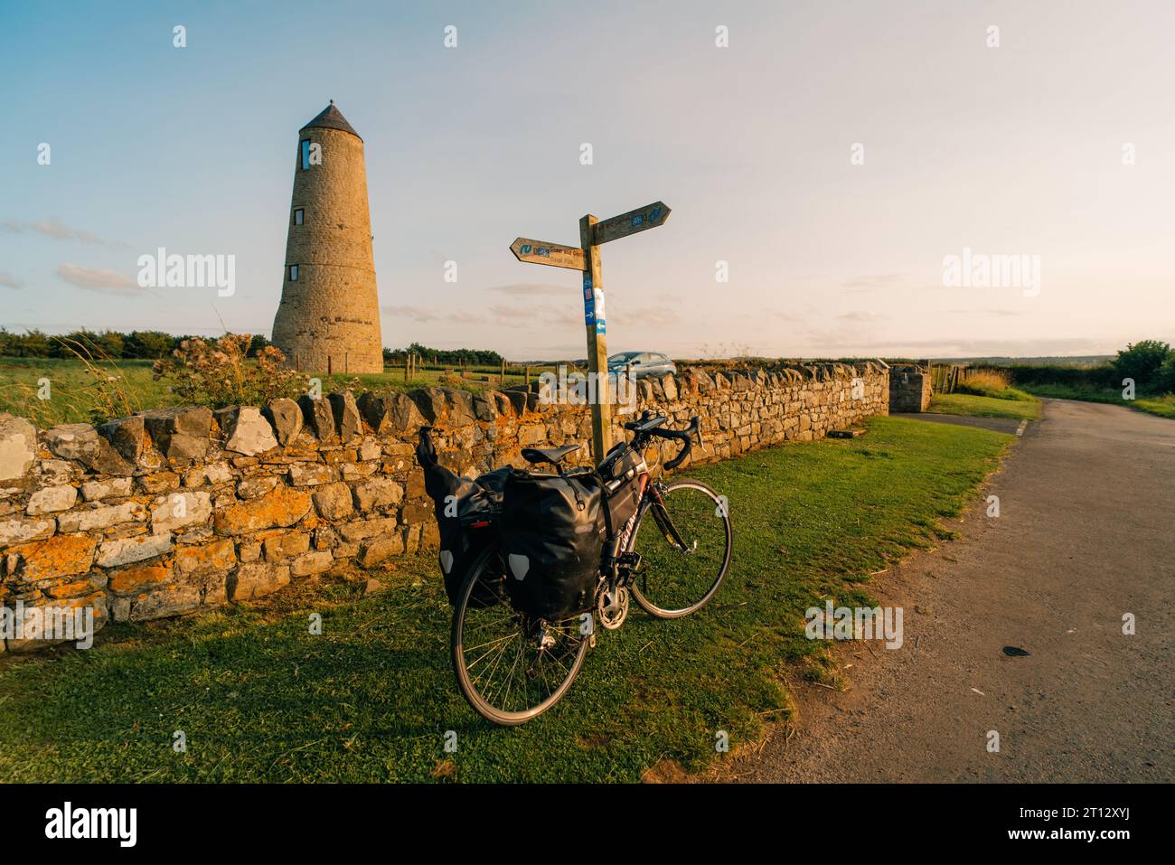 Traveller on bicycle. Solo travel long distance bicycle touring concept ...