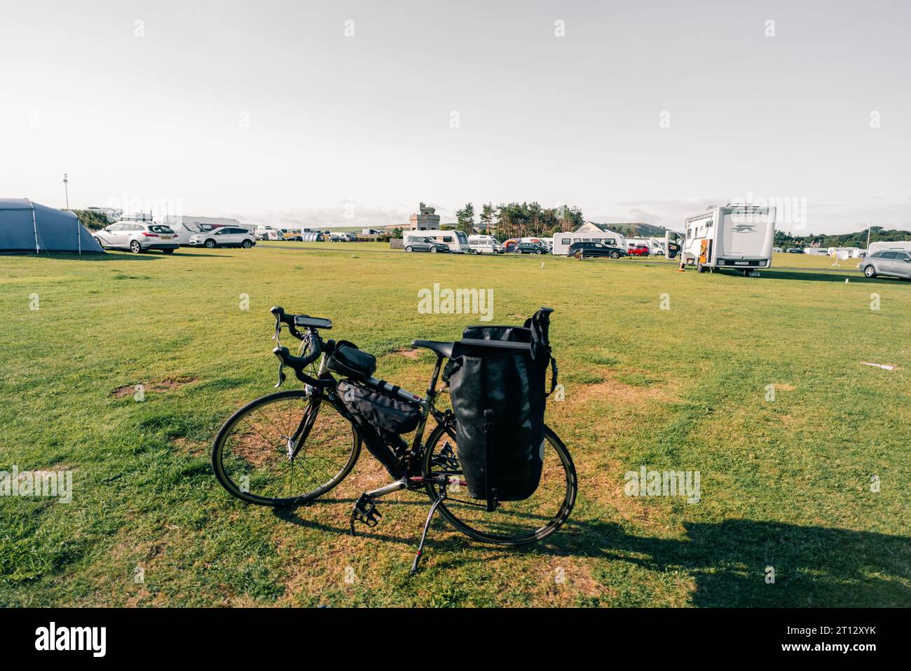 Traveller on bicycle. Solo travel long distance bicycle touring concept ...
