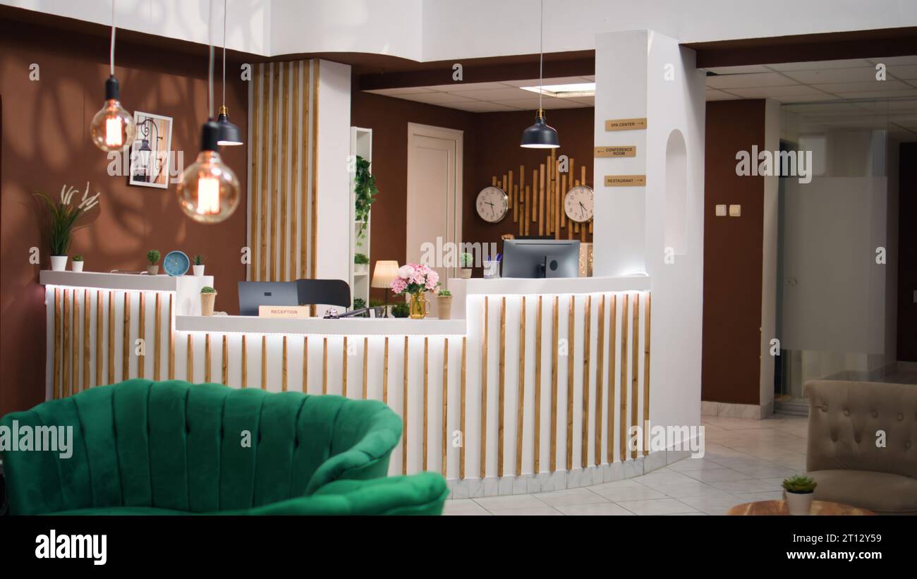 Interior of welcoming rustic hospitality industry hotel lobby filled ...