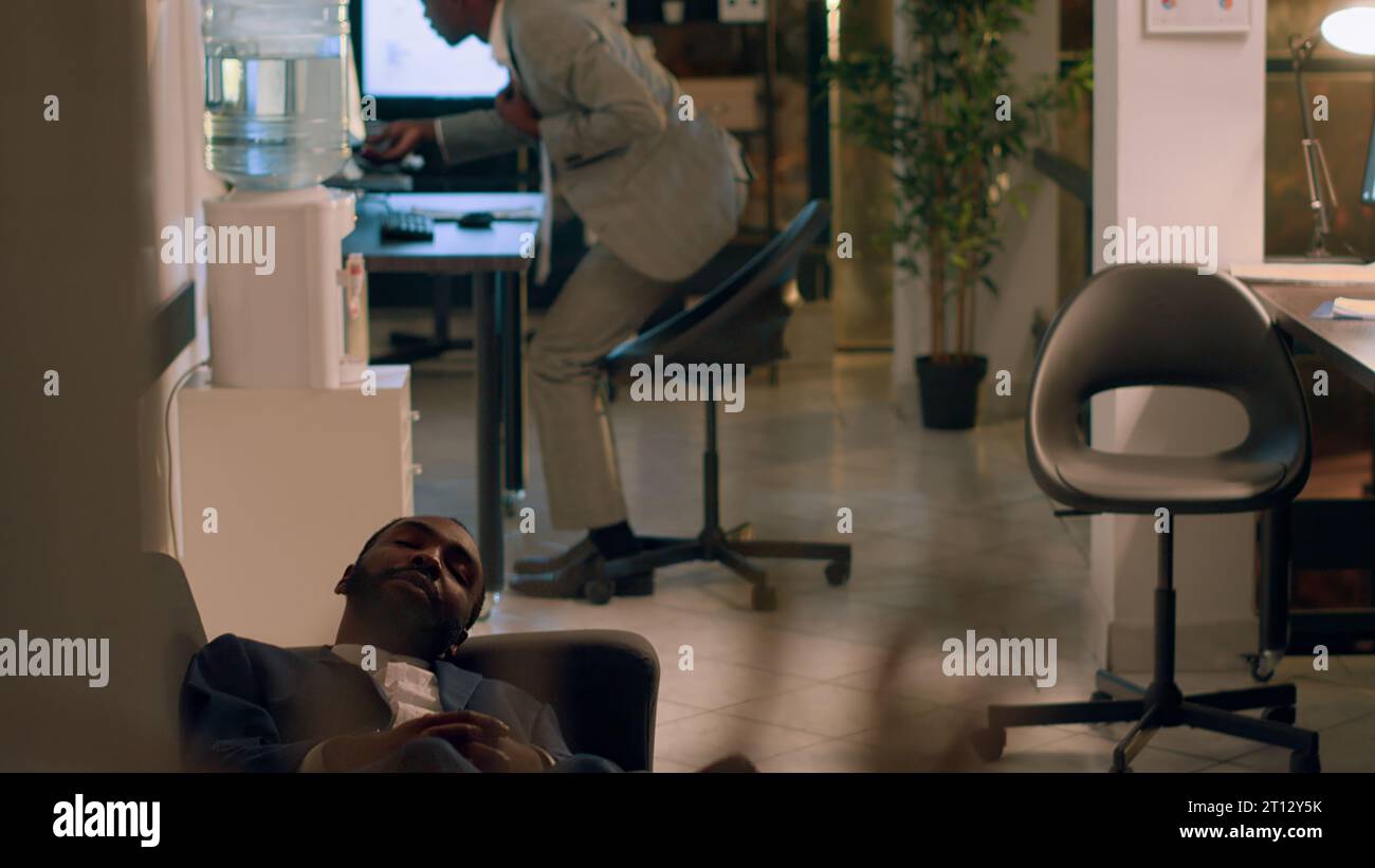 Team leader finishing nightshift, ready to go home, catching tired ...