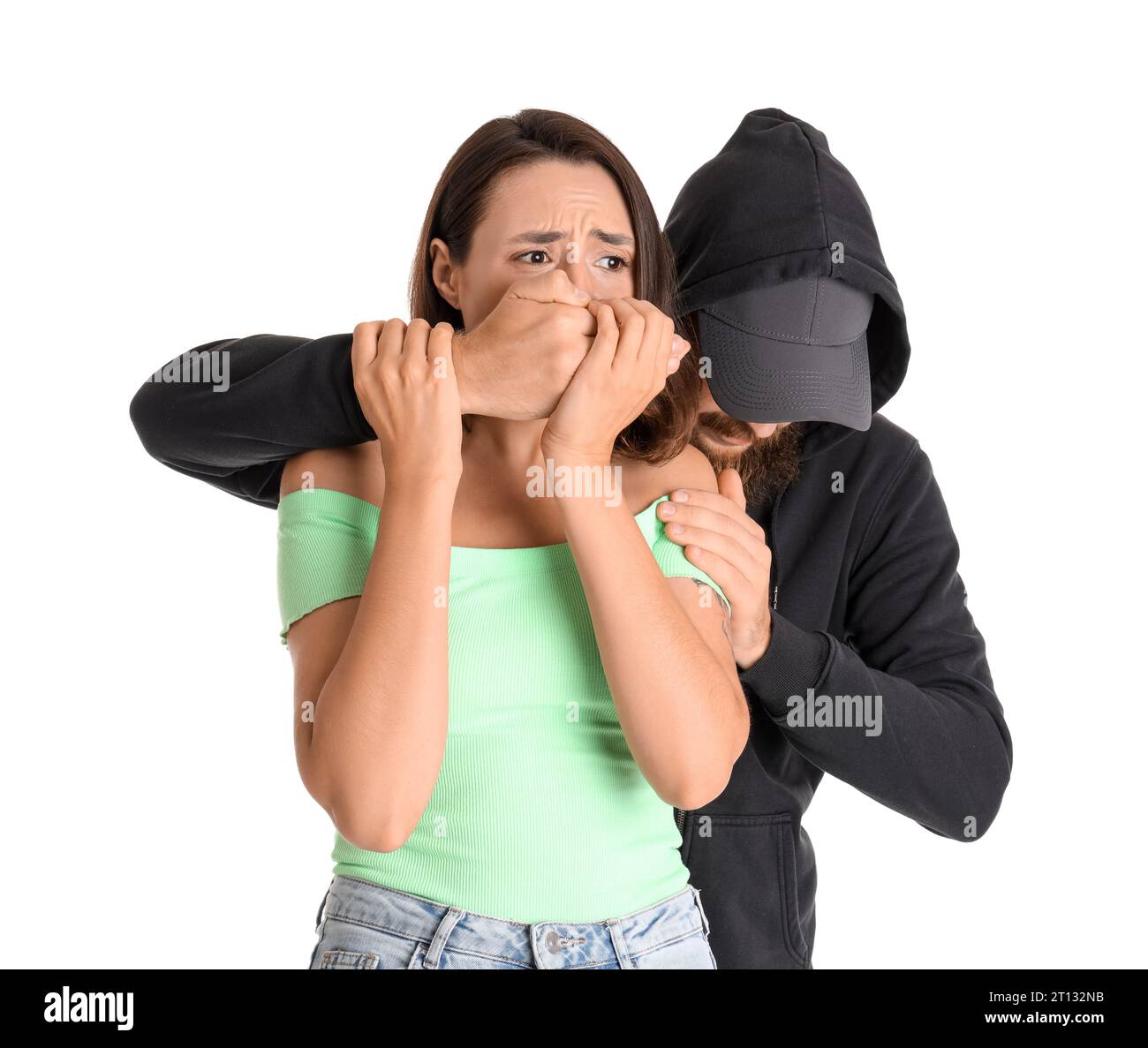 Bandit attacking scared young woman on white background Stock Photo - Alamy