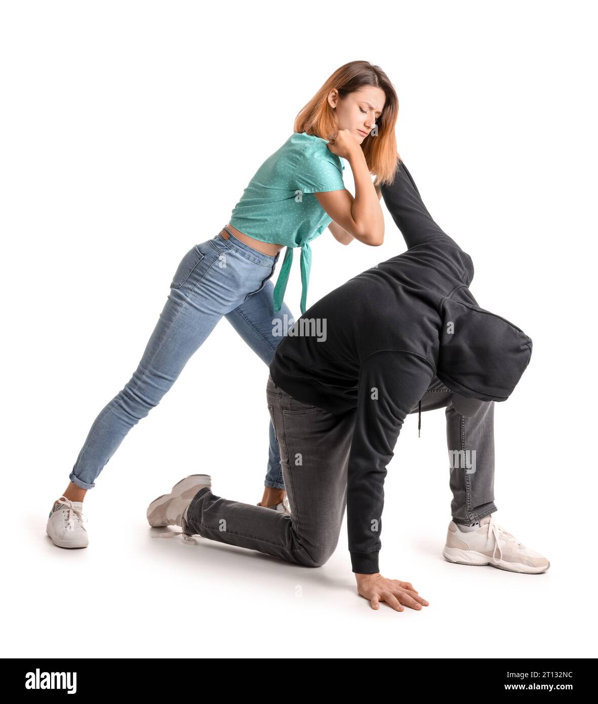 Young woman defending herself against robber on white background Stock ...