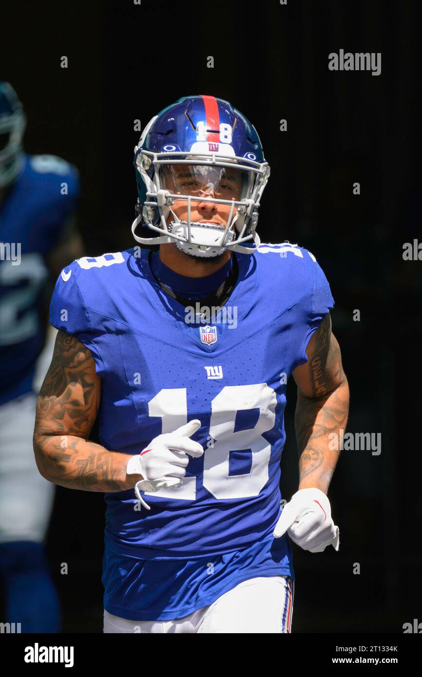 New York Giants wide receiver Isaiah Hodgins (18) runs onto the field ...