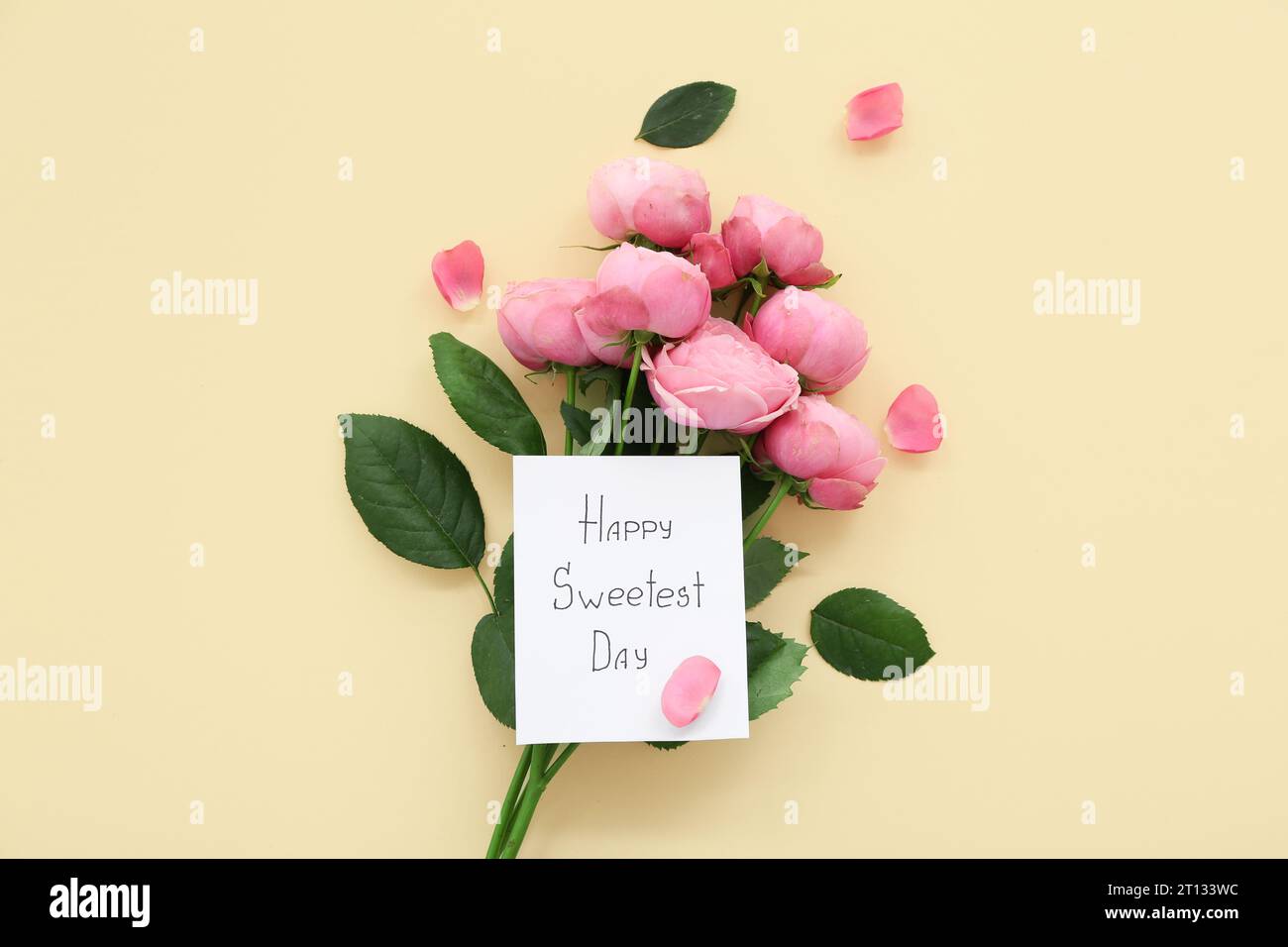 Greeting card with text HAPPY SWEETEST DAY and bouquet of rose flowers ...