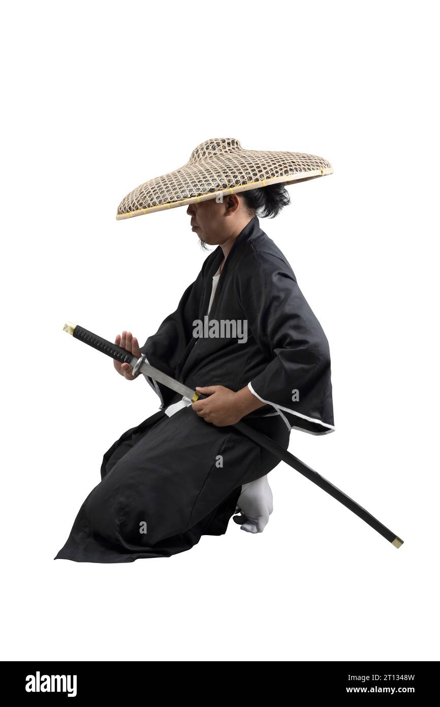 Samurai warrior gripping the sword isolated over white background Stock ...