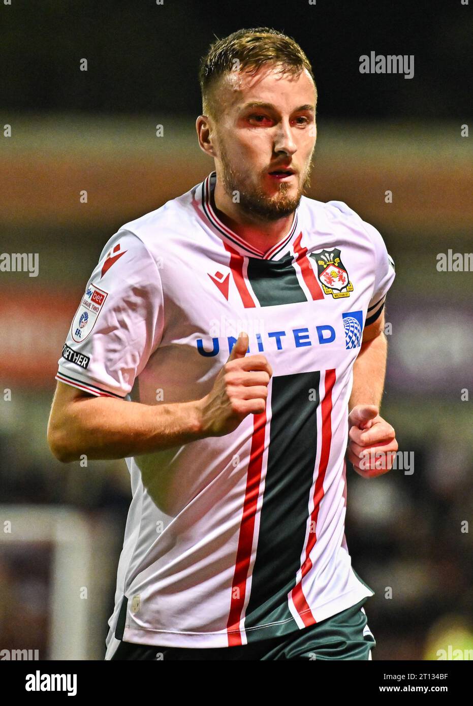 Luke Young 8# of Wrexham Association Football Club, during the EFL ...