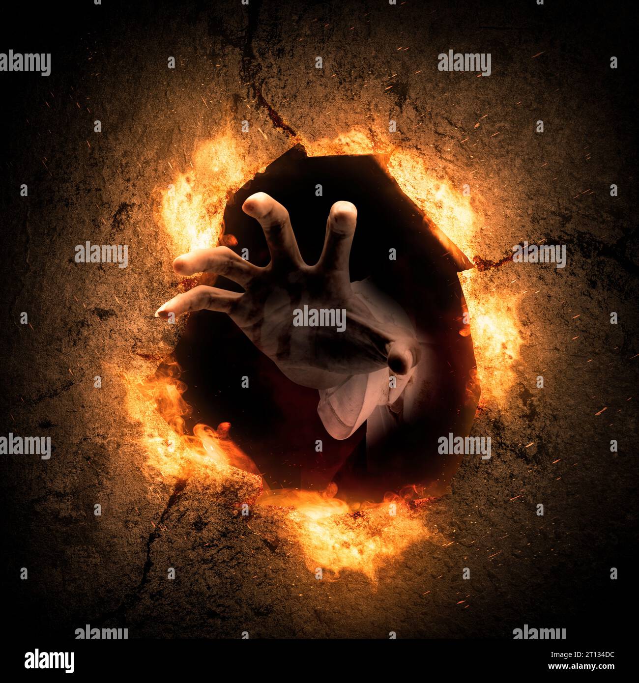 Zombie's hand on the hole with a fire flames background. Scary ...
