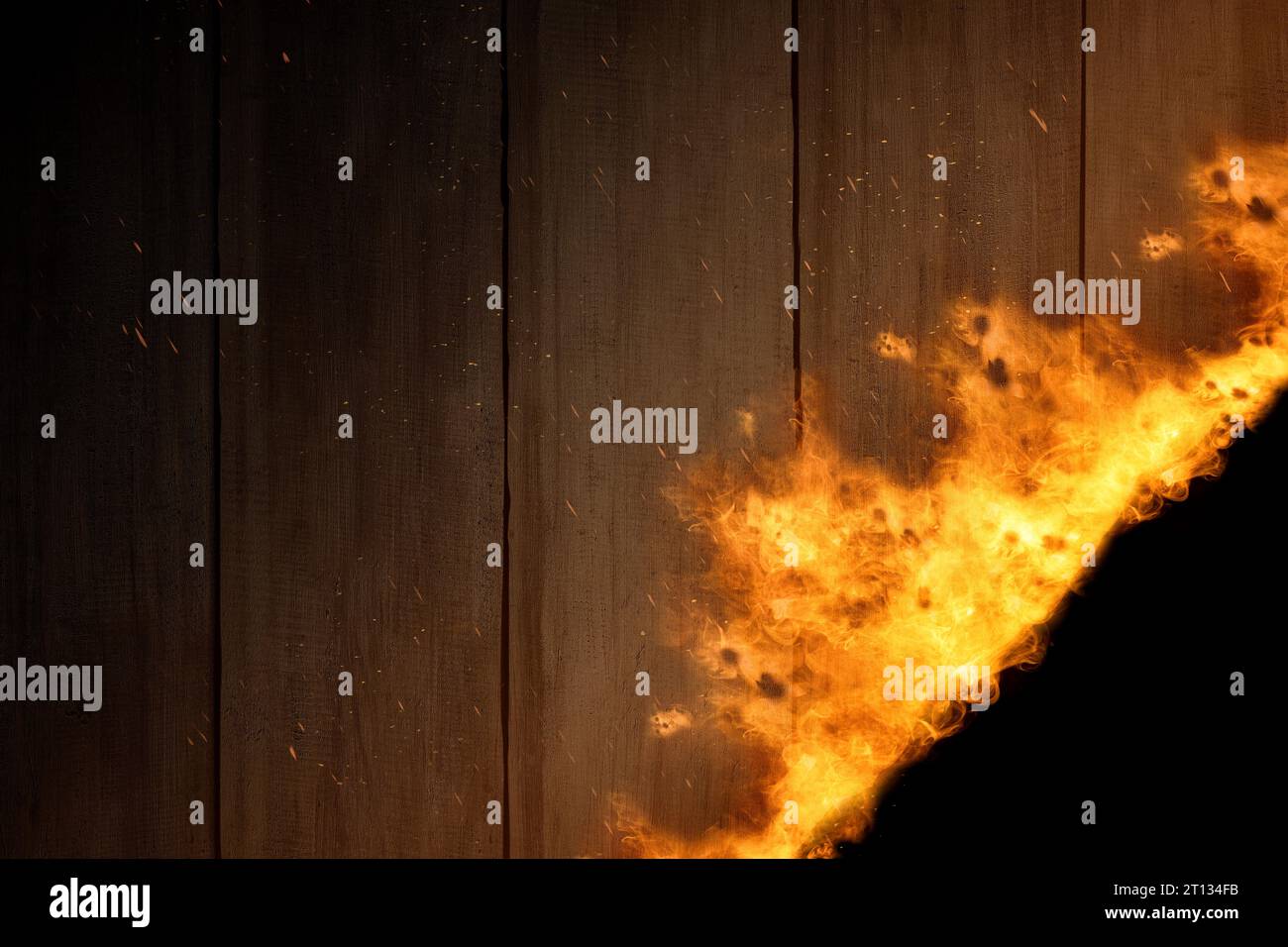Wooden wall with fire flame on a dark background. Scary Halloween ...