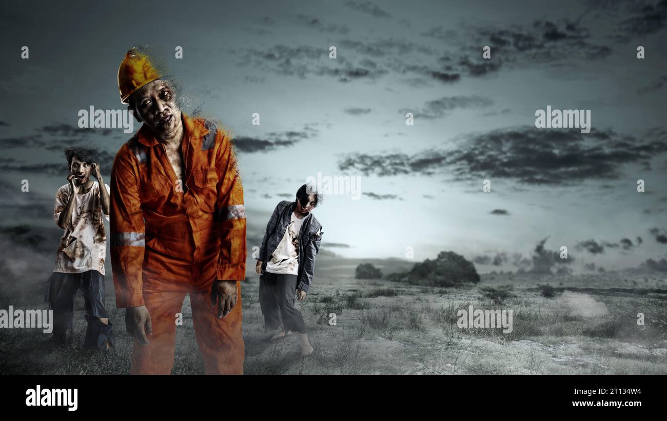 A group of scary zombies with blood and wounds on their bodies are ...