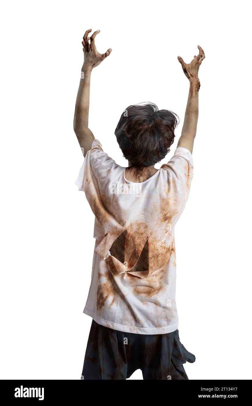 Rear view of a scary zombie with blood and wounds on his body walking ...