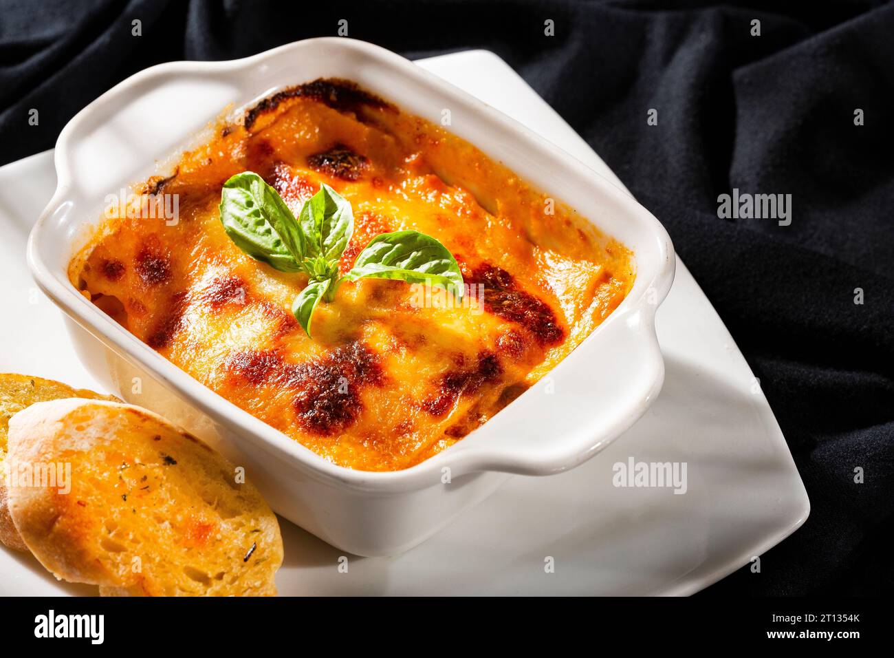 Lasagna bolognese in square hi-res stock photography and images - Alamy