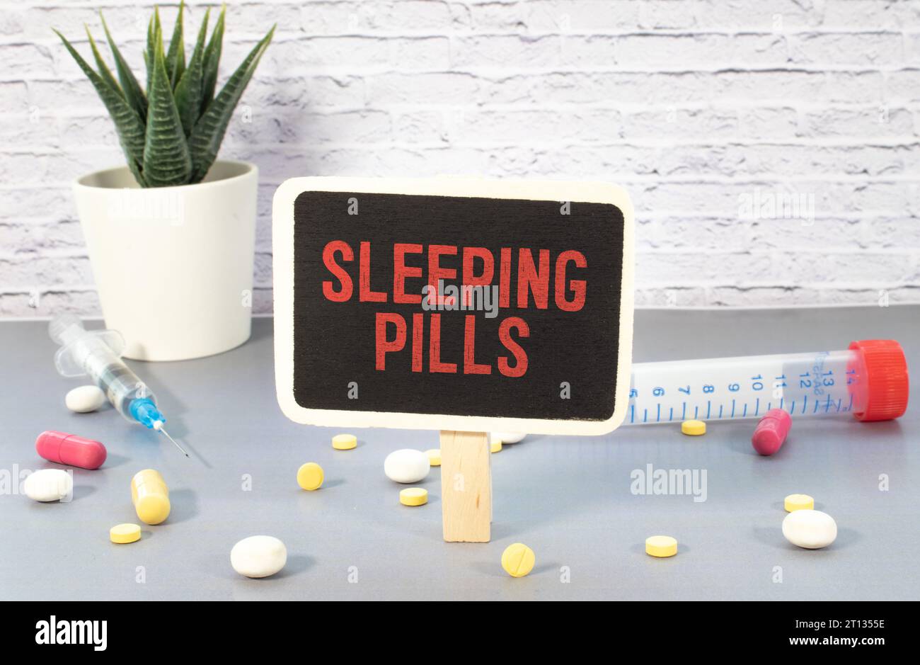 SLEEPING PILLS text on a letterhead in a medical folder on a beautiful ...