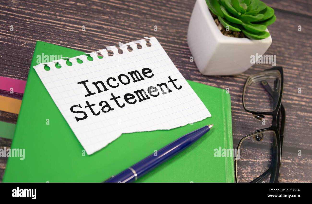 Notebook with pencils, glasses on the graph background, with text ...