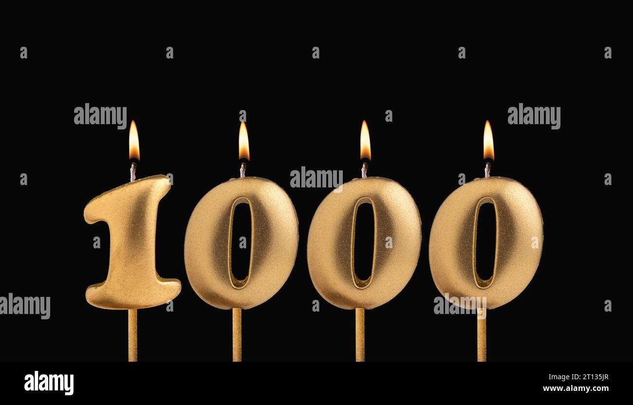 Candle number 1000 - Number of followers or likes Stock Photo - Alamy