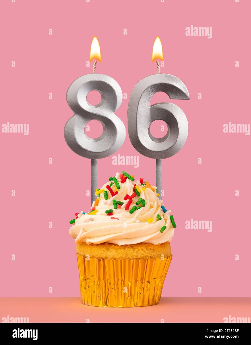 Number 86 candle with cupcake - Birthday card Stock Photo - Alamy