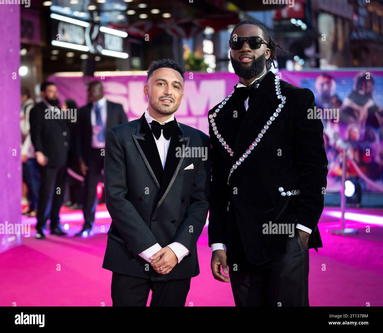 Adam Deacon, left, and Jazzie Zonzolo pose for photographers upon ...