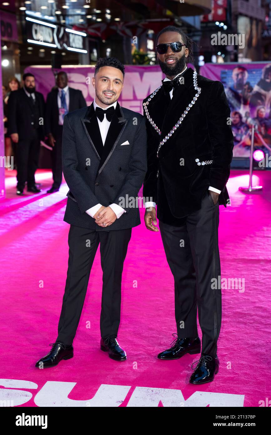 Adam Deacon, left, and Jazzie Zonzolo pose for photographers upon ...