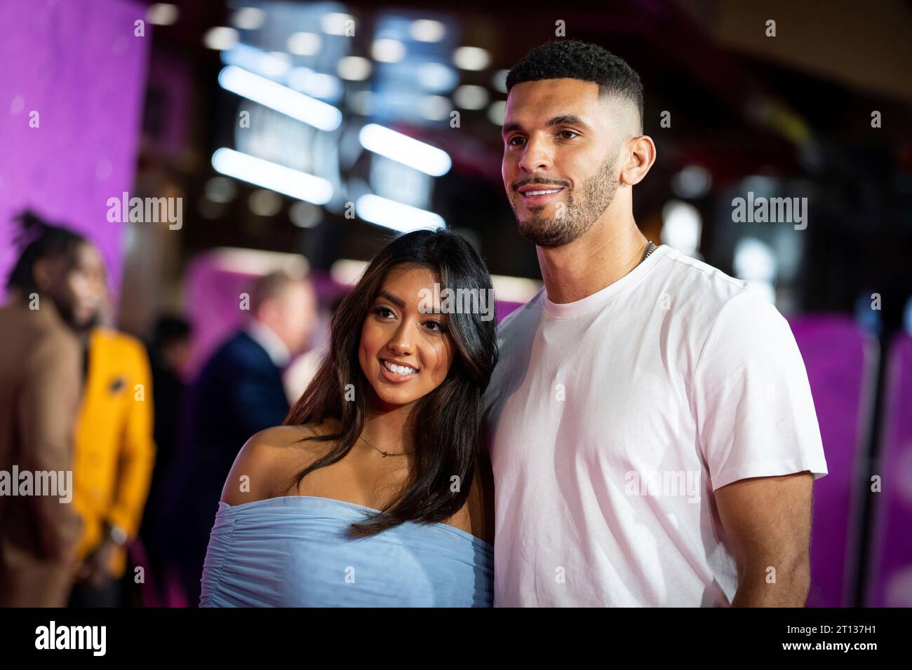 Sanam Harrinanan, left, and Kai Fagan pose for photographers upon ...