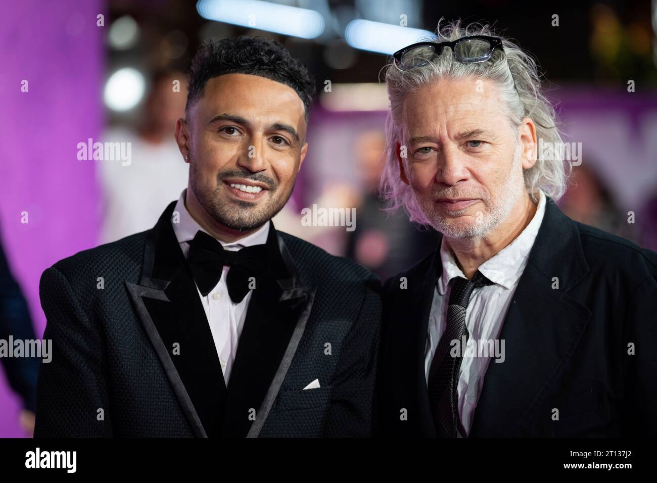 Adam Deacon, left, and Dexter Fletcher pose for photographers upon ...