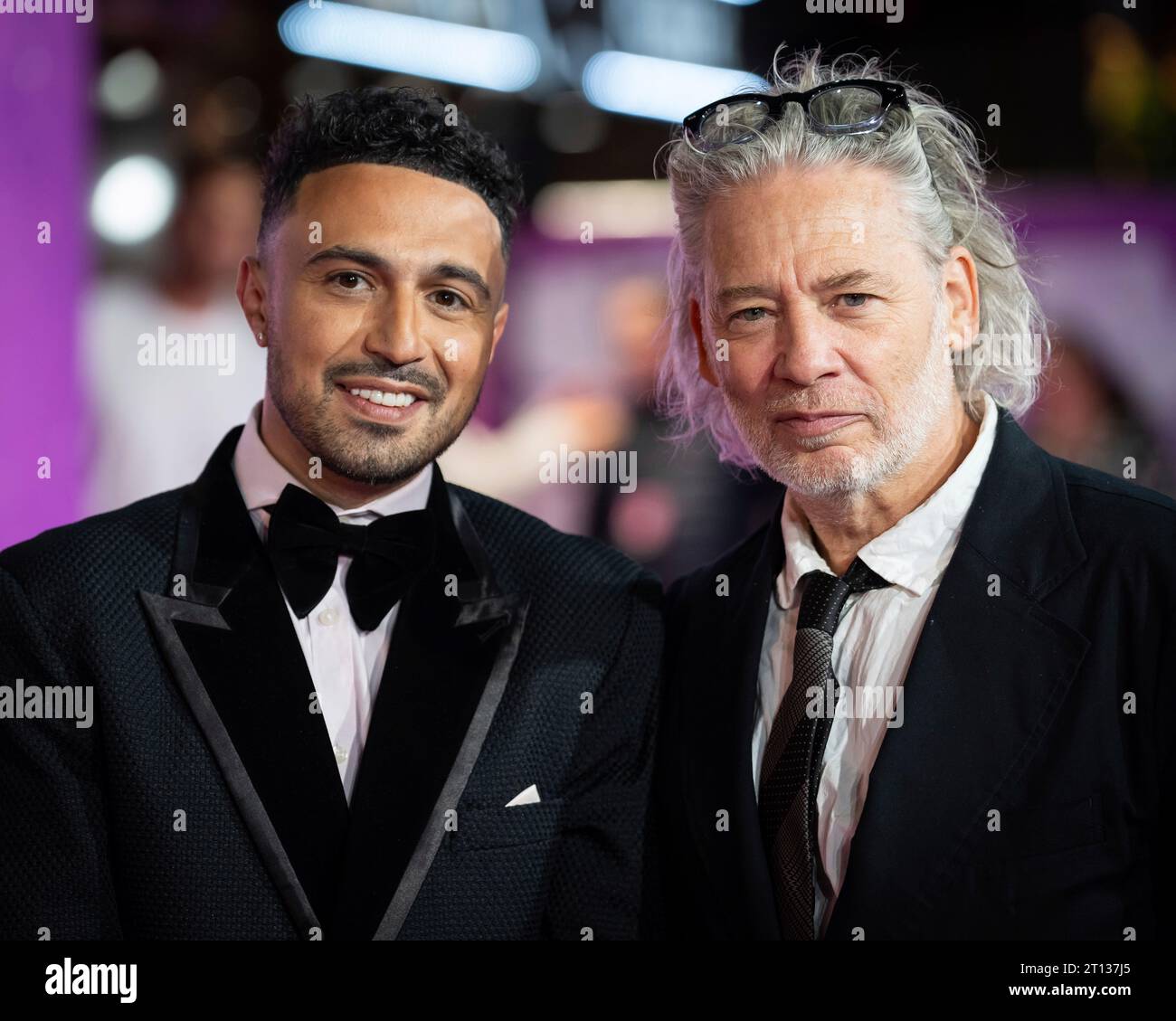 Adam Deacon, left, and Dexter Fletcher pose for photographers upon ...