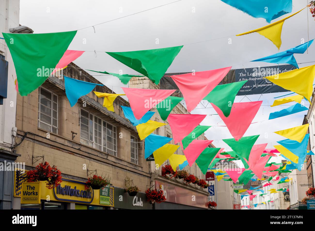 Falmouth town centre Cornwall, street bunting tied across church street ...
