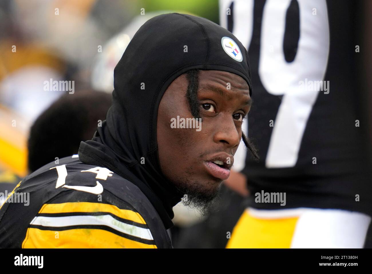 Pittsburgh Steelers wide receiver George Pickens sits on the bench ...