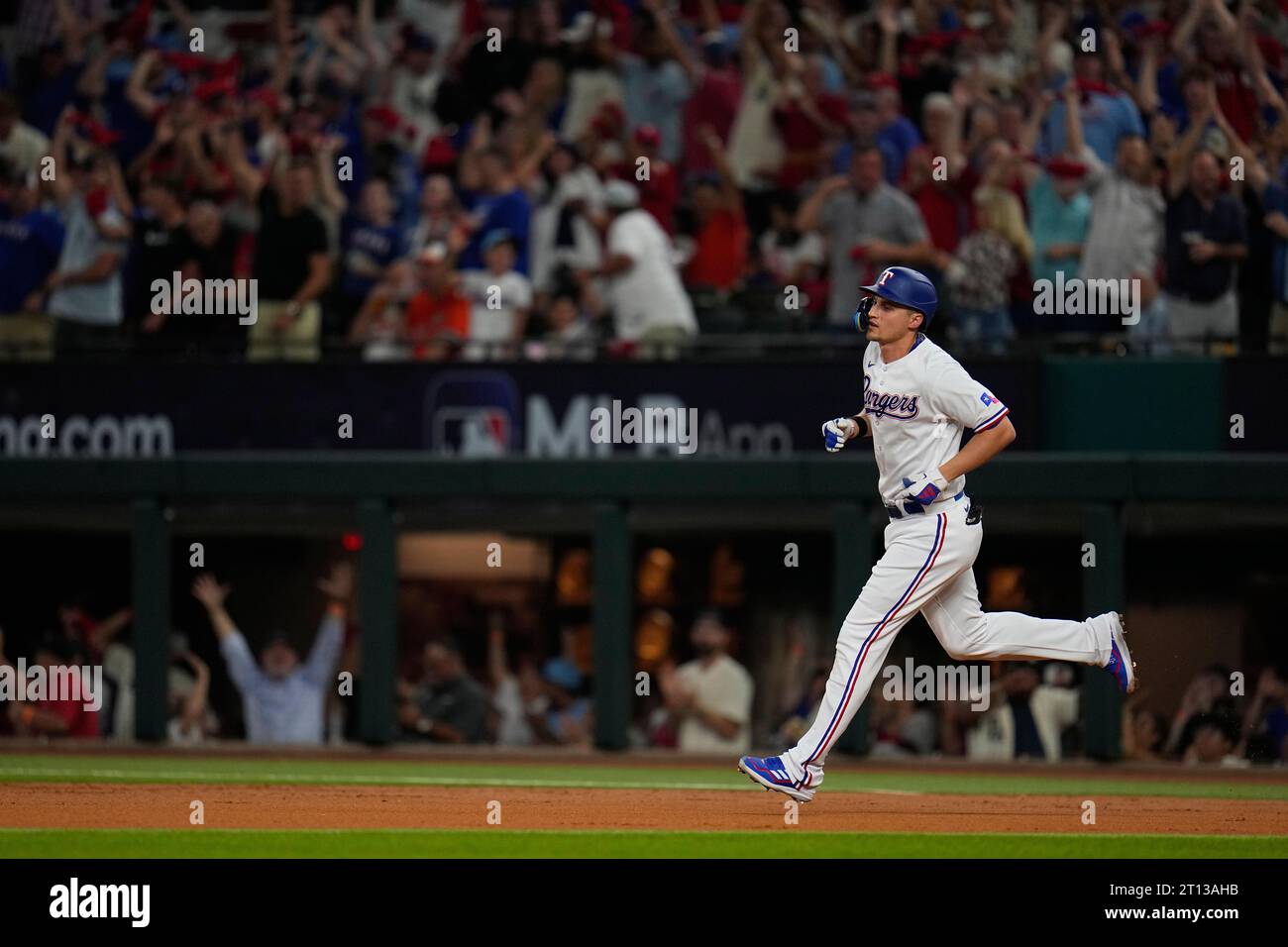 Texas Rangers' Corey Seager runs the bases after hitting a solo home ...
