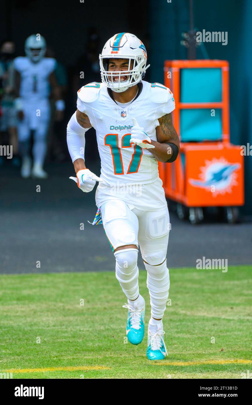 Miami Dolphins wide receiver Jaylen Waddle (17) smiles as he runs onto ...