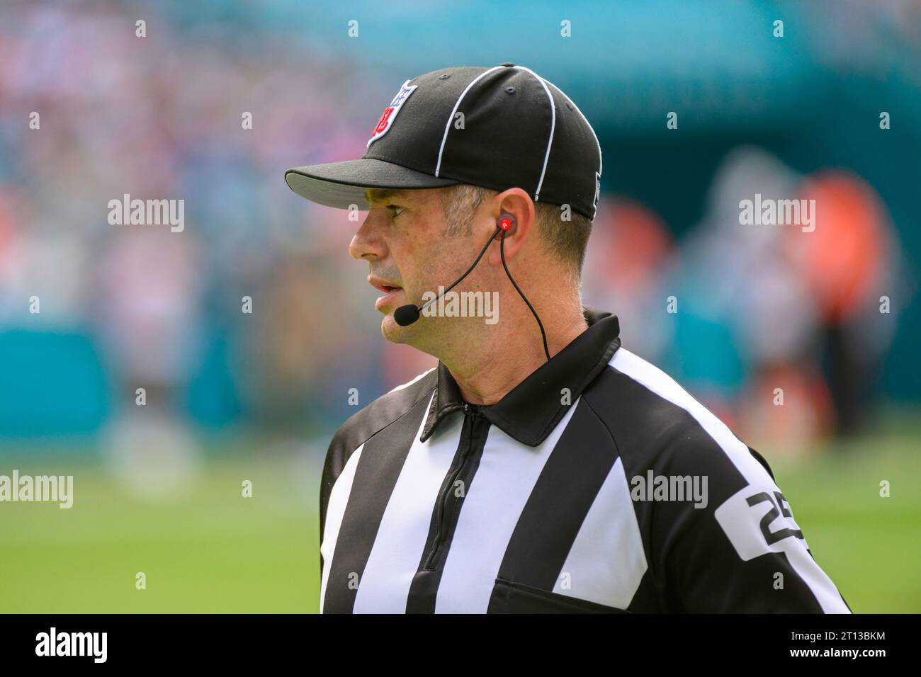 NFL field judge Ryan Dickson stands on the field during an NFL football game between the New ...