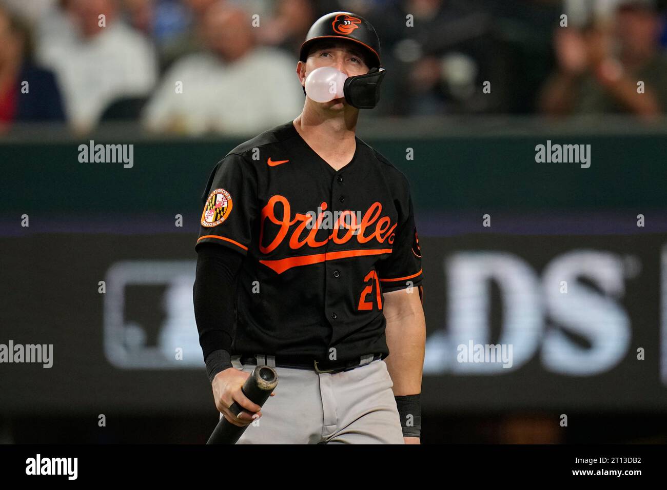 Baltimore Orioles' Austin Hays blows a bubble as he walks back to the ...
