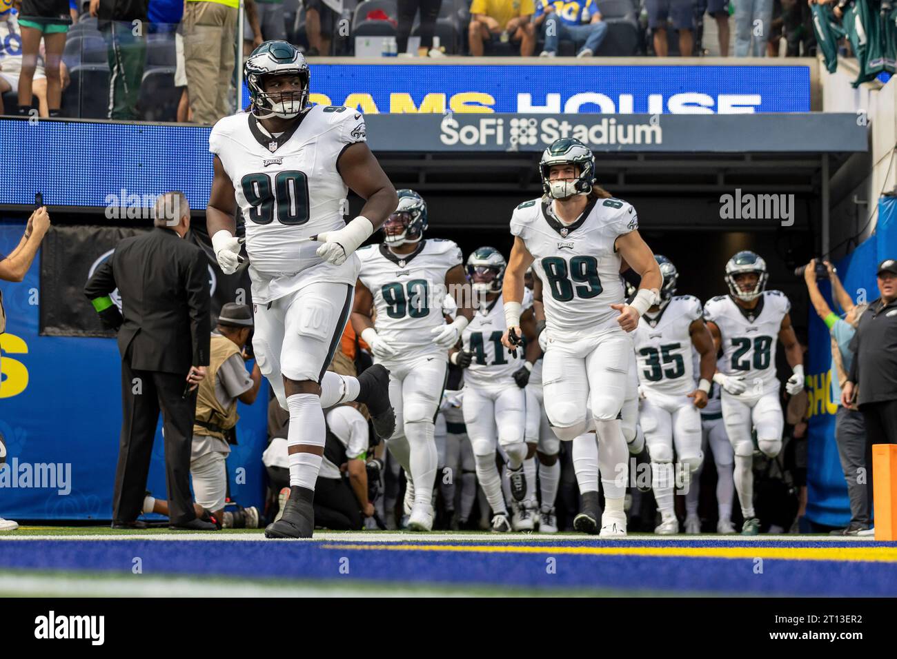 The Philadelphia Eagles run onto the field before playing against the ...