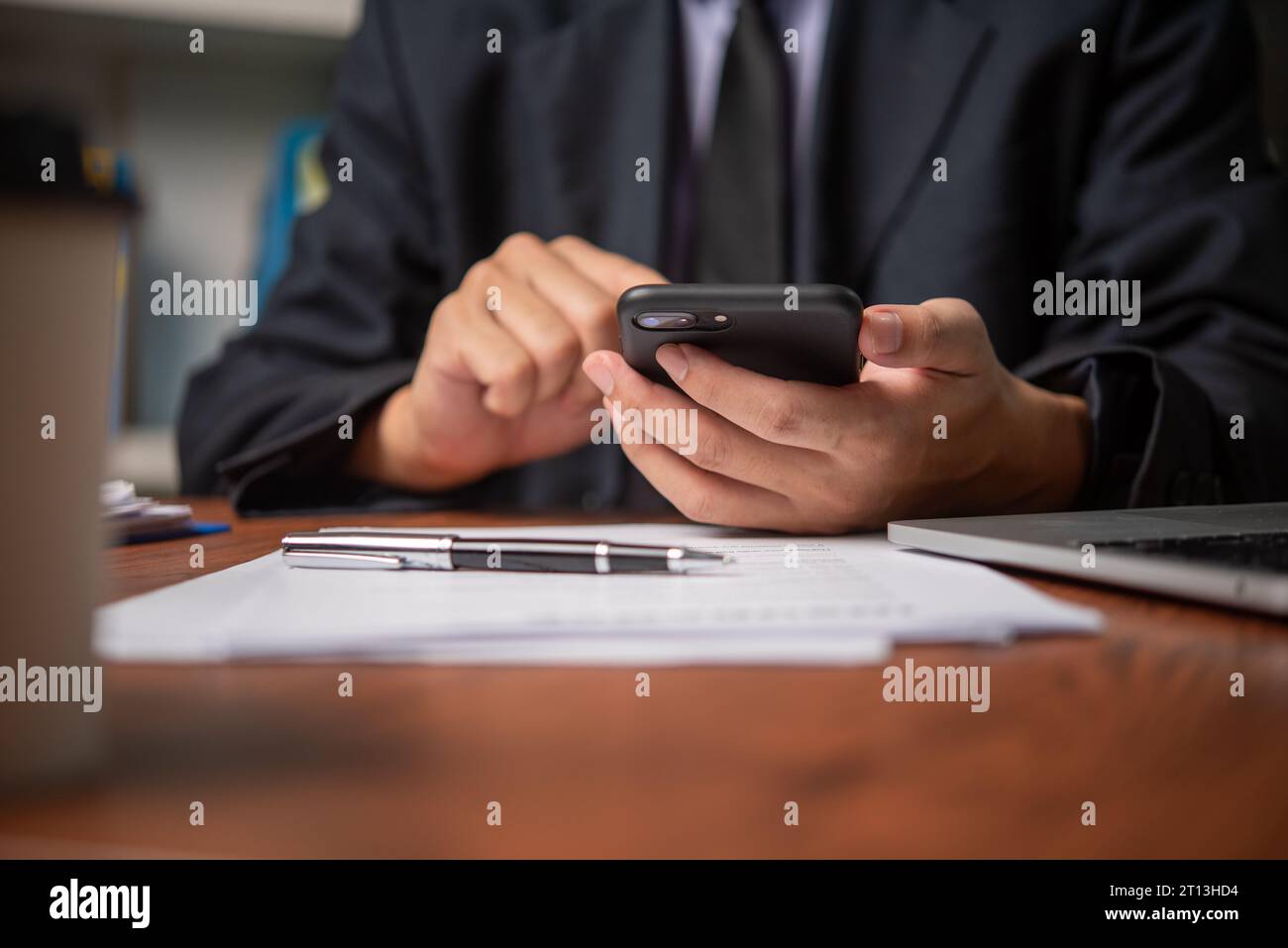 Business man using mobile smart phone management information financial ...