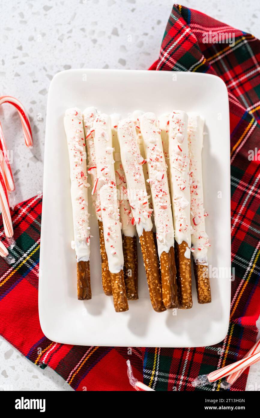 Candy cane chocolate covered pretzel rods Stock Photo - Alamy